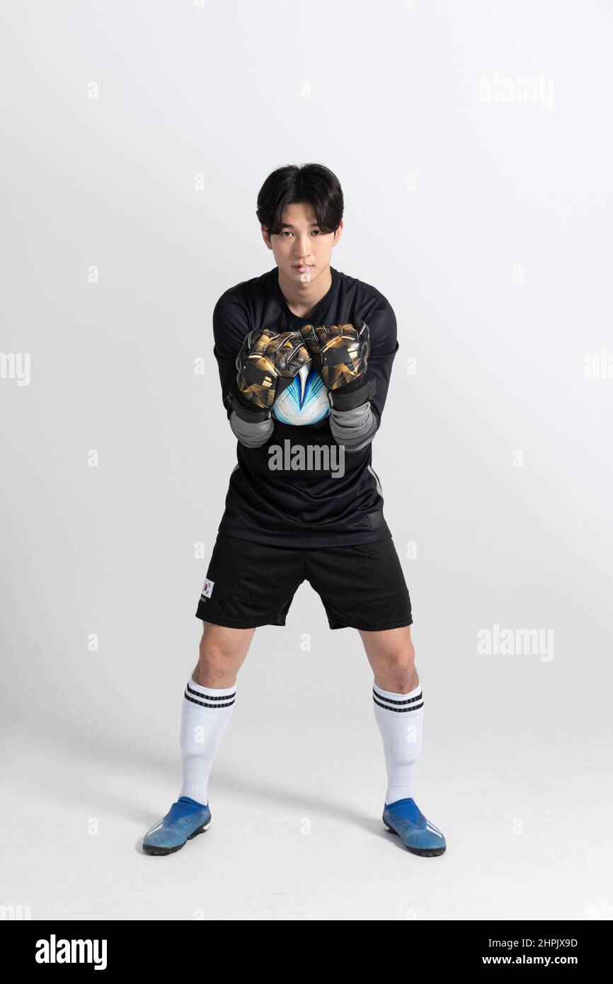 soccer football sports player, asian korean man with motions in studio ...