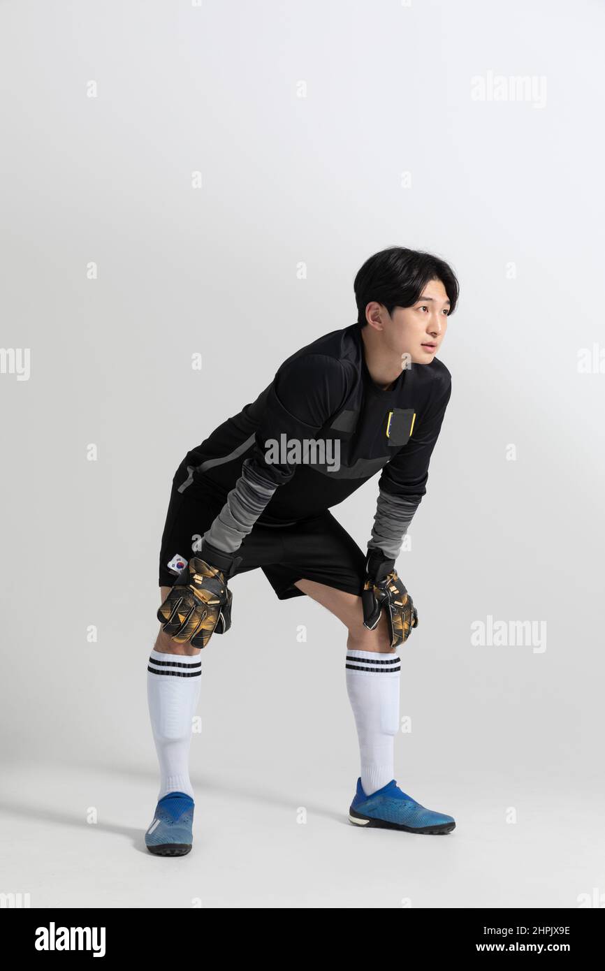 soccer football sports player, asian korean man with motions in studio ...