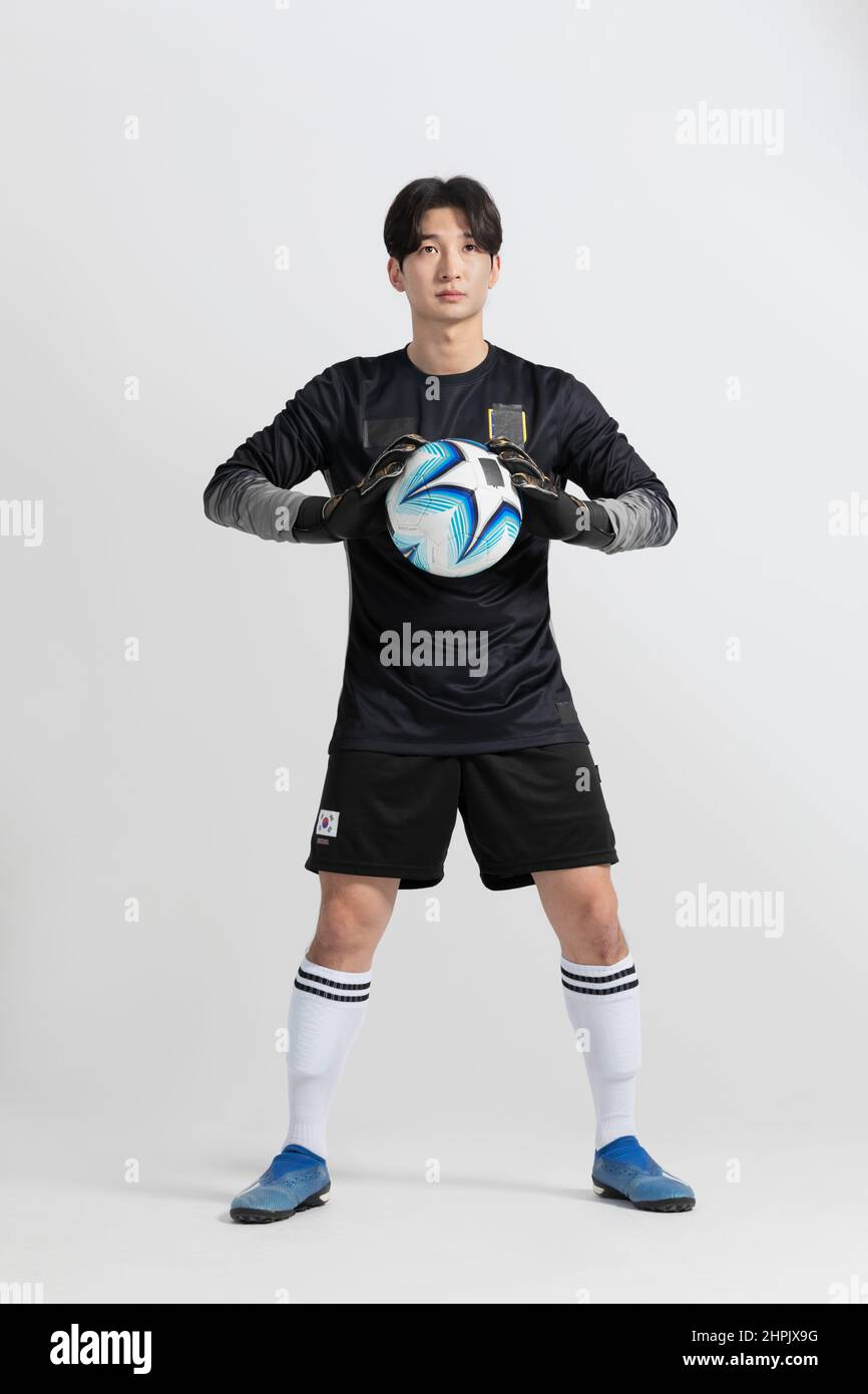 soccer football sports player, asian korean man with motions in studio ...