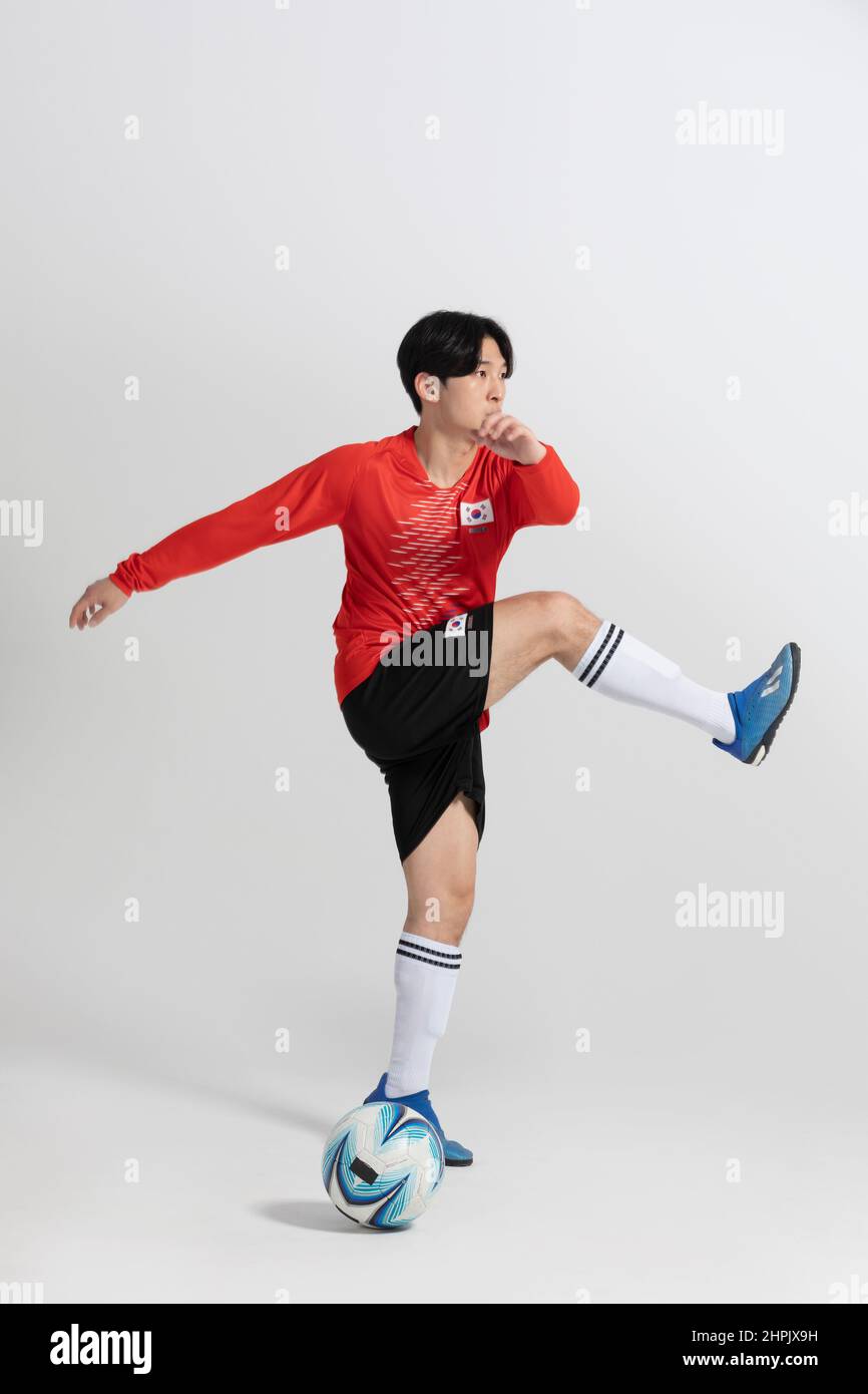 soccer football sports player, asian korean man with motions in studio ...