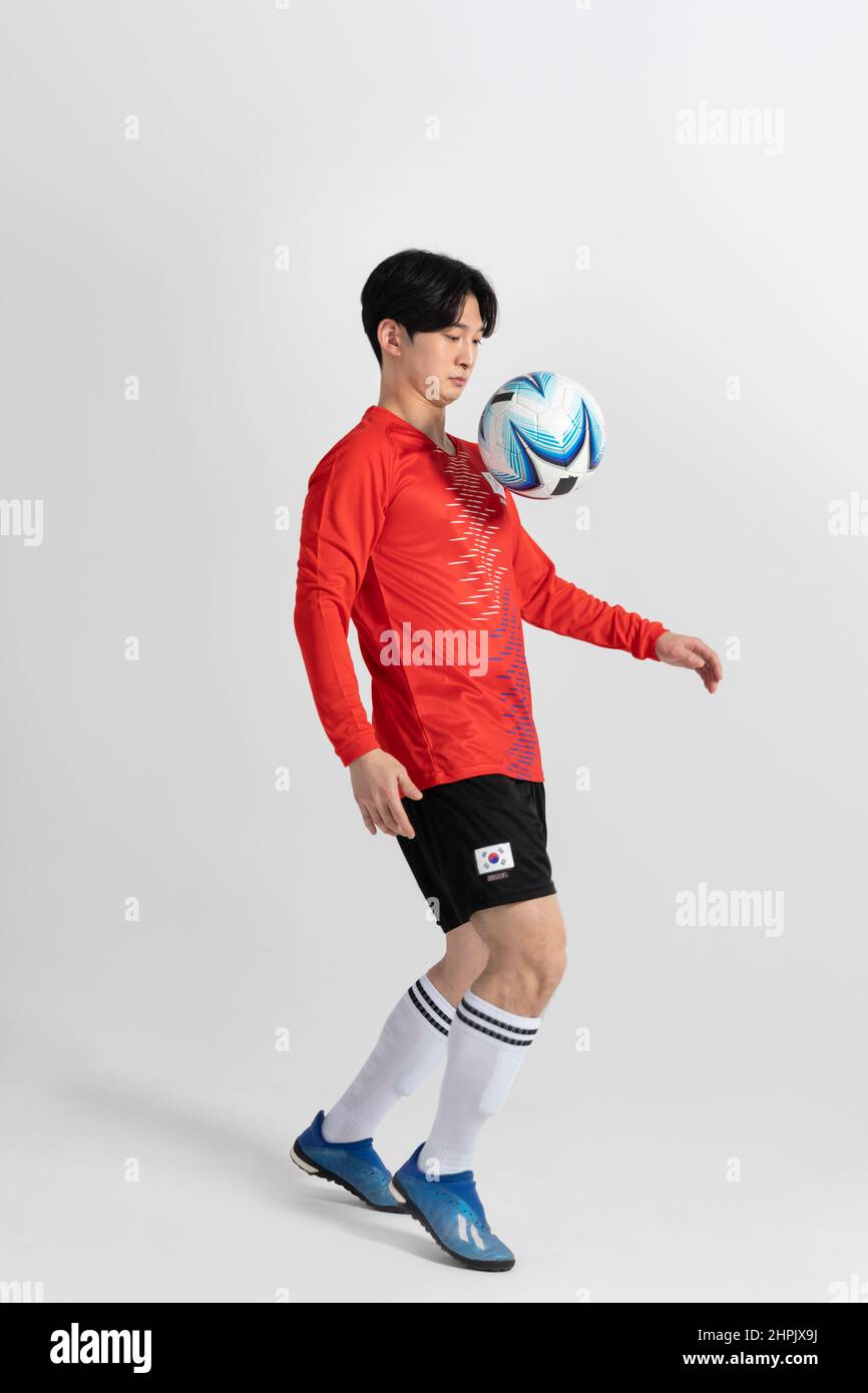 soccer football sports player, asian korean man with motions in studio ...