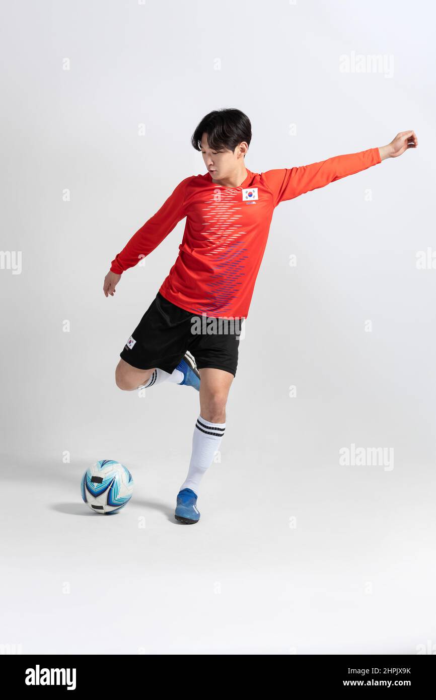 soccer football sports player, asian korean man with motions in studio ...