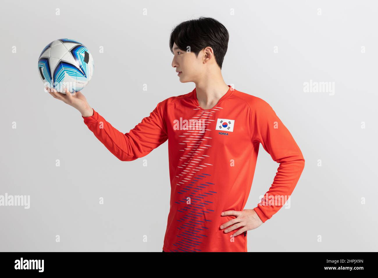 soccer football sports player, asian korean man with motions in studio ...