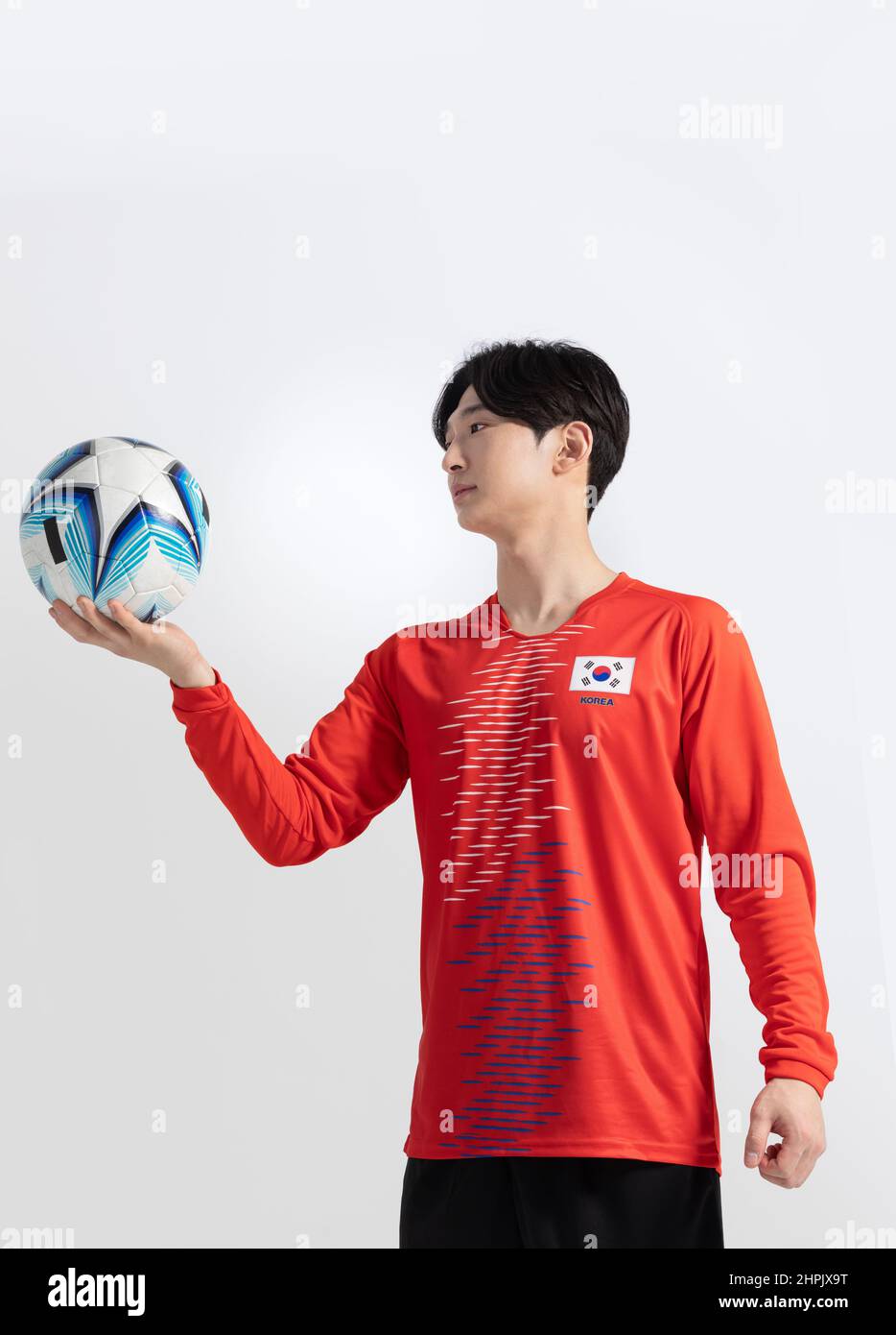 soccer football sports player, asian korean man with motions in studio ...