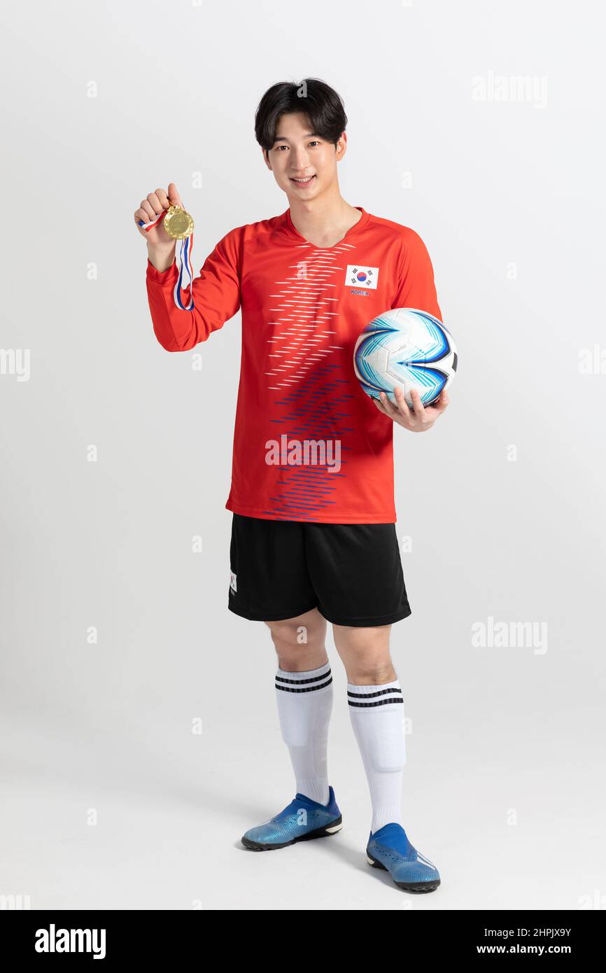 soccer football sports player, asian korean man with motions in studio ...