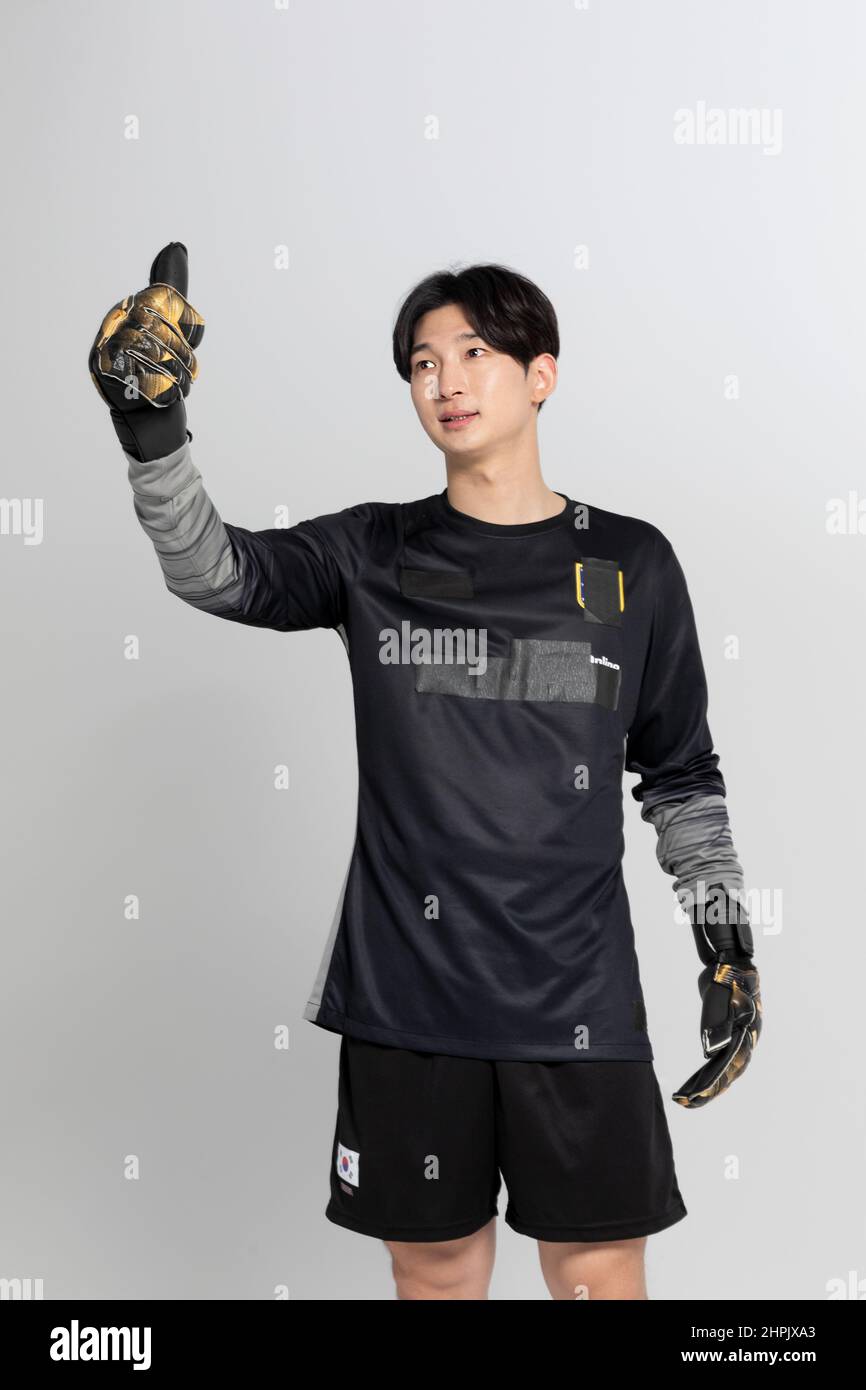 soccer football sports player, asian korean man with motions in studio ...