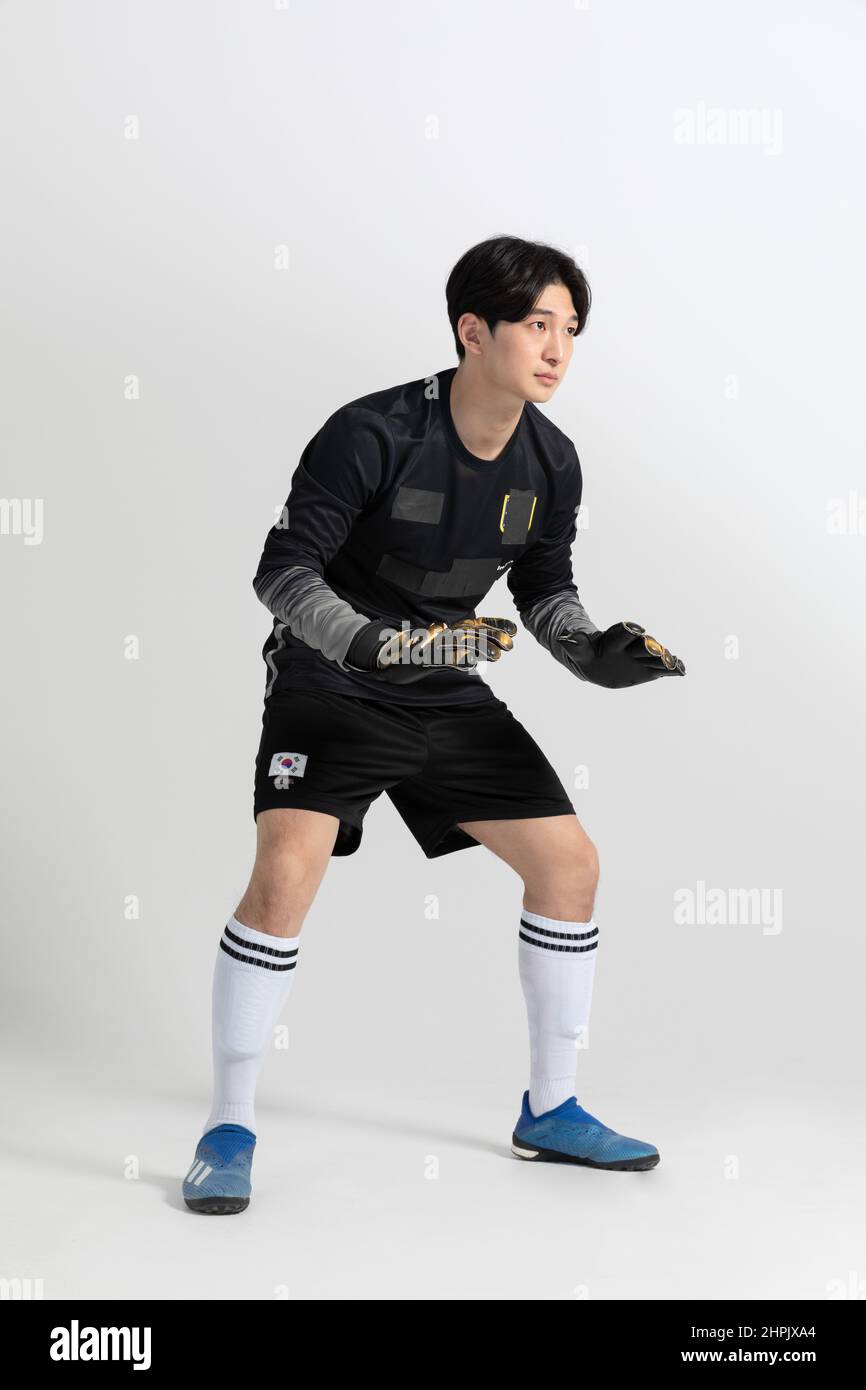 soccer football sports player, asian korean man with motions in studio ...
