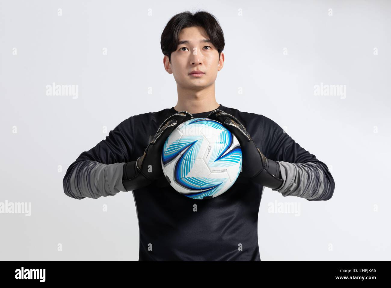 soccer football sports player, asian korean man with motions in studio ...