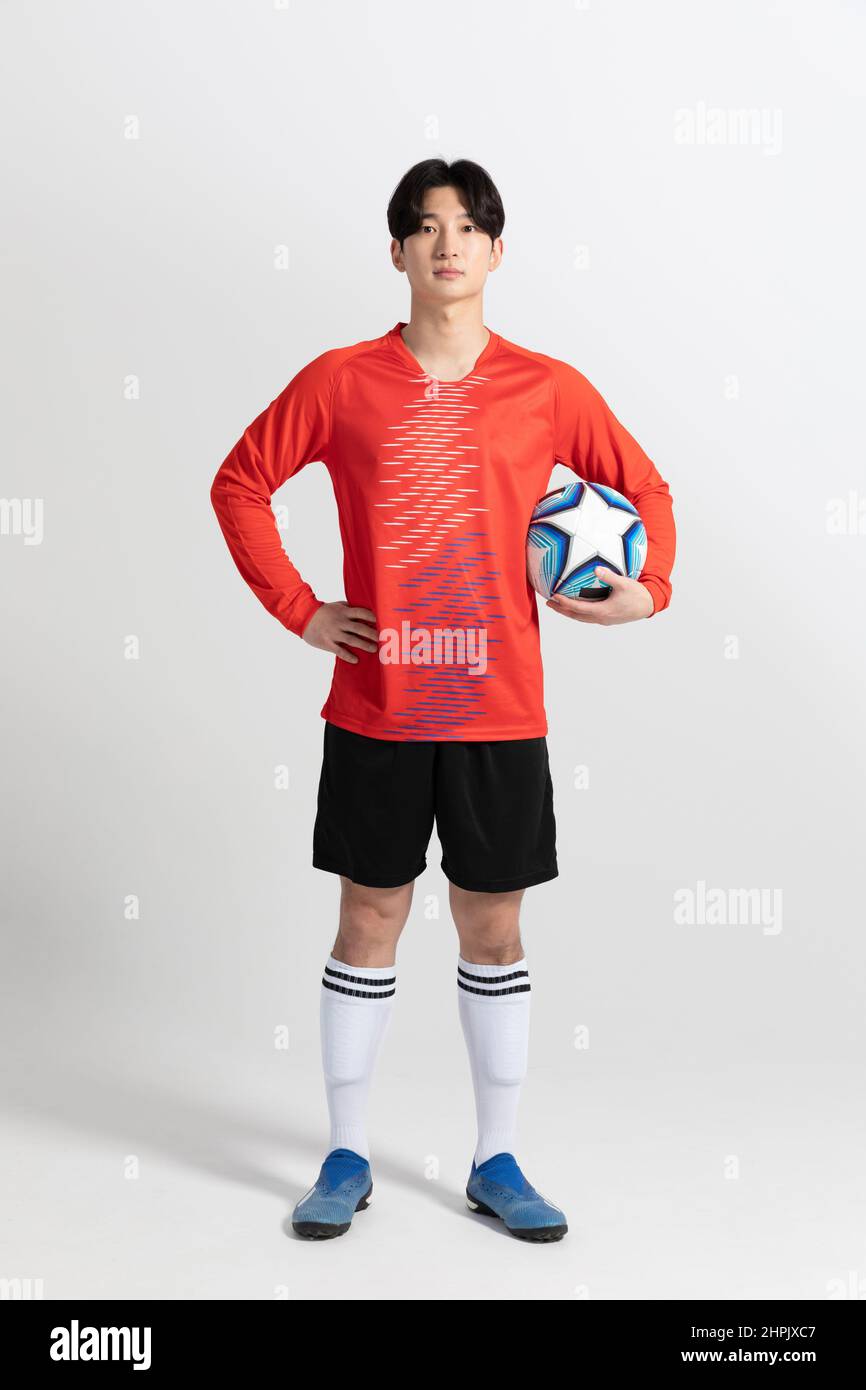 soccer football sports player, asian korean man with motions in studio ...