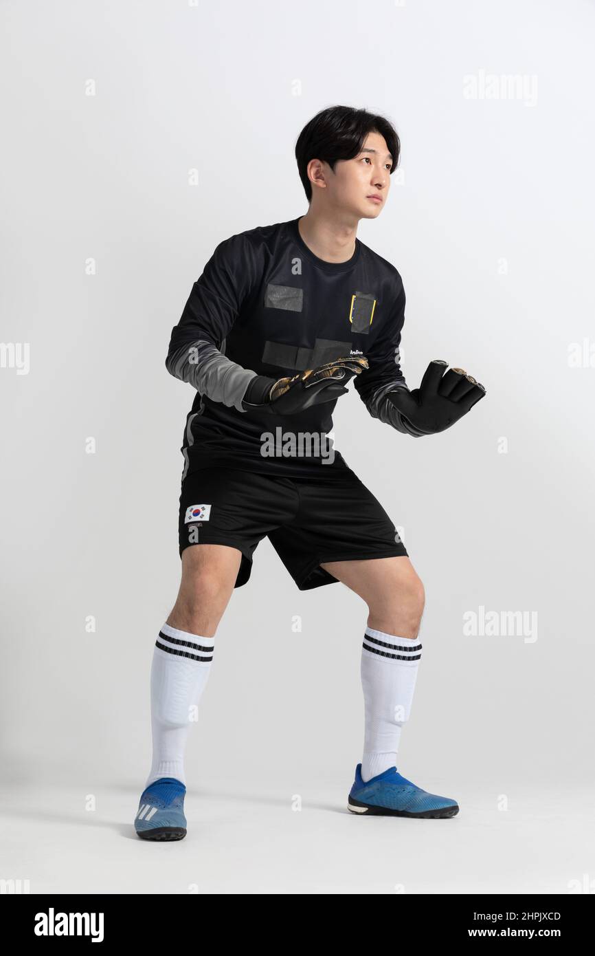 soccer football sports player, asian korean man with motions in studio ...