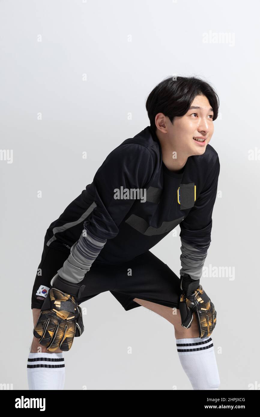 soccer football sports player, asian korean man with motions in studio ...