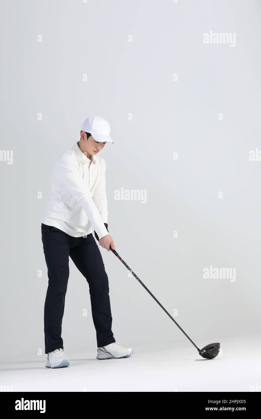 golf sports player, asian korean man with golf club in studio Stock ...