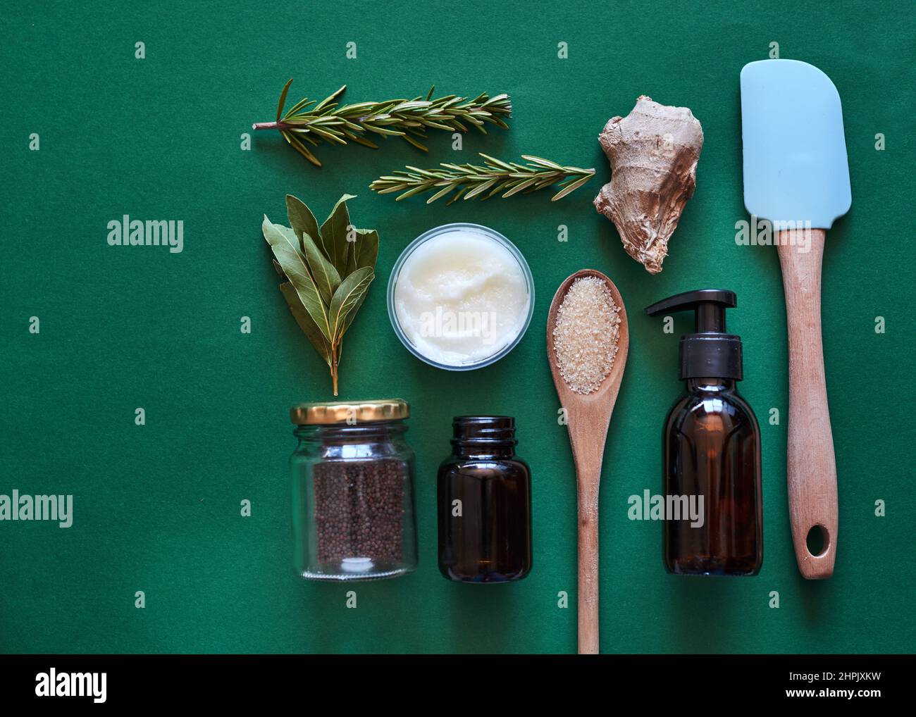 Homemade aromatherapy bath and spa products on a green background. Flat ...