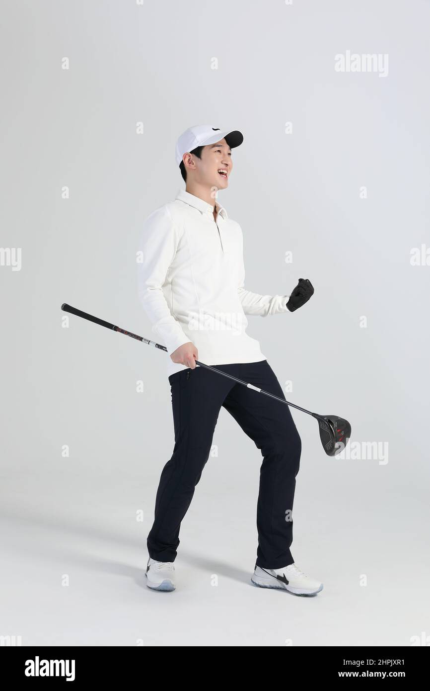 golf sports player, asian korean man with golf club in studio Stock ...