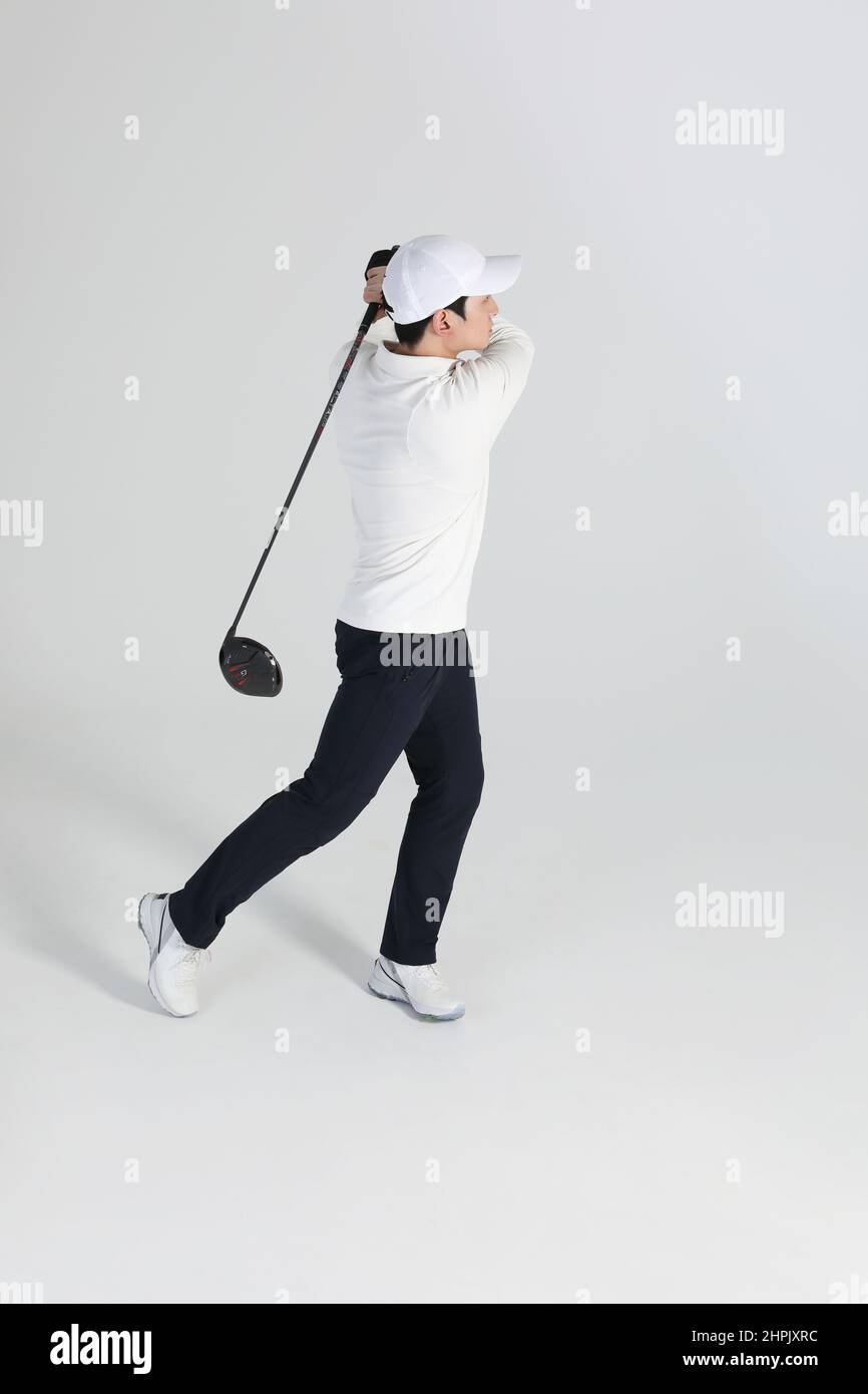 golf sports player, asian korean man with golf club in studio Stock ...