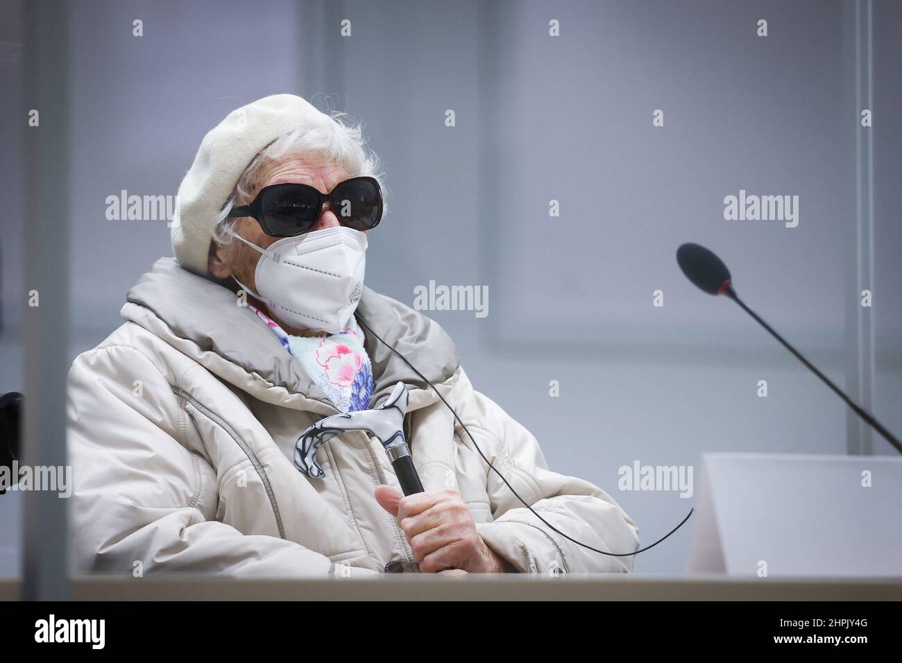Itzehoe, Germany. 22nd Feb, 2022. The defendant Irmgard F. sits in the ...