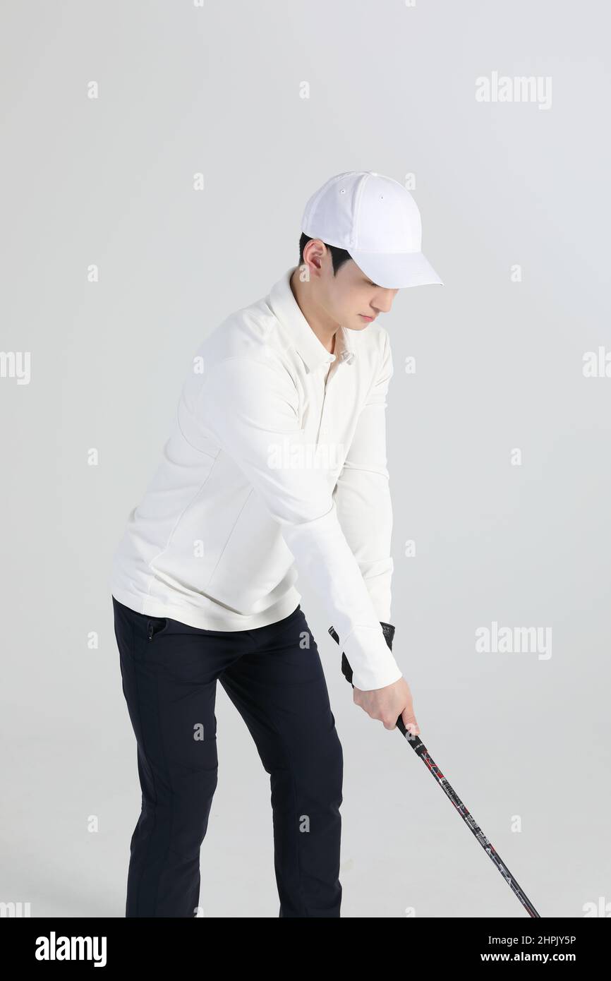 golf sports player, asian korean man with golf club in studio Stock ...