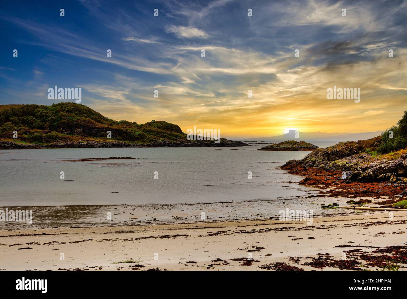 Dramatic sky as the sun sets over the beach at Loch Morar,fifth-largest ...
