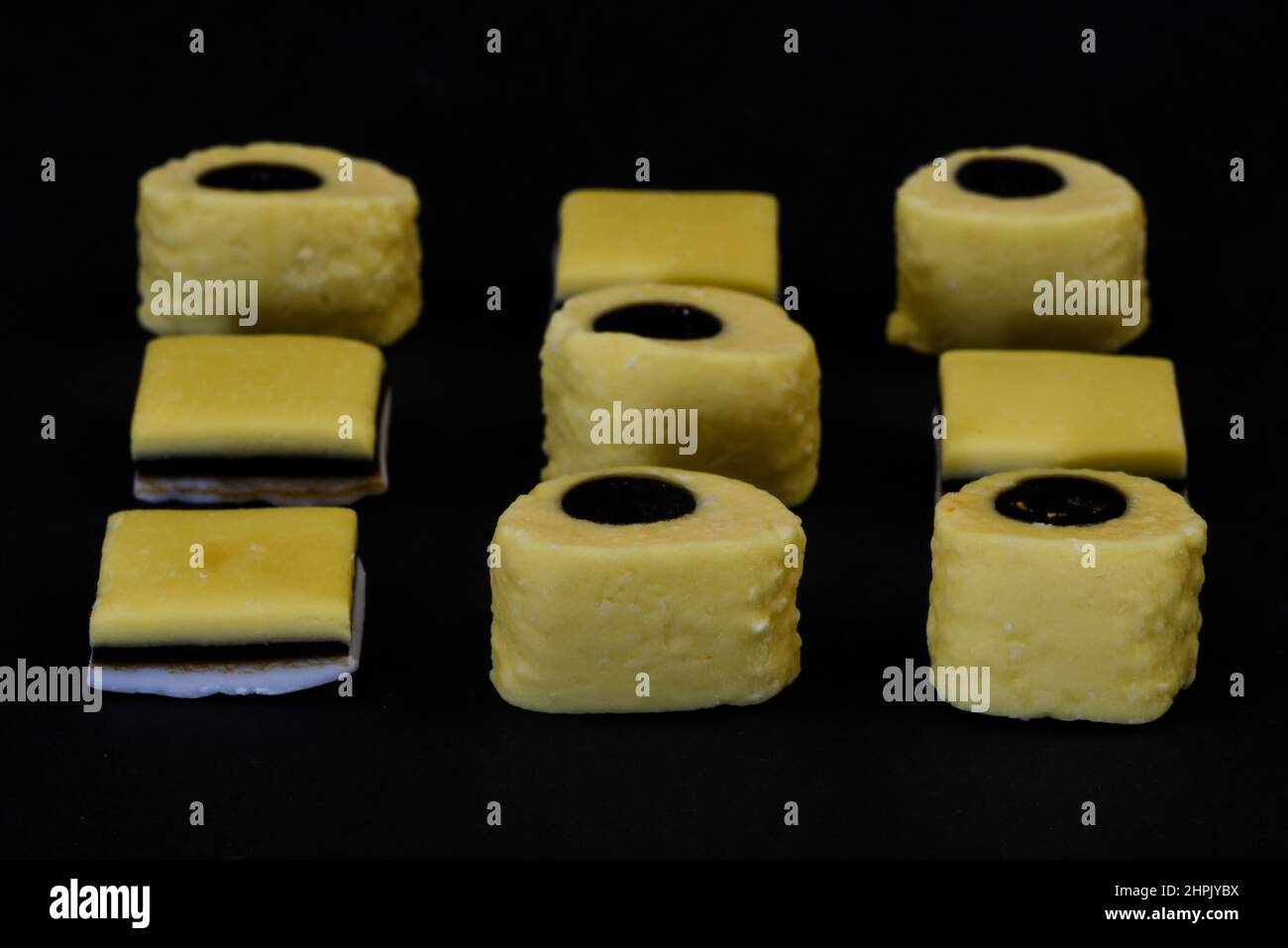 Den Helder, the Netherlands. January 2022. Yellow licorice in different ...