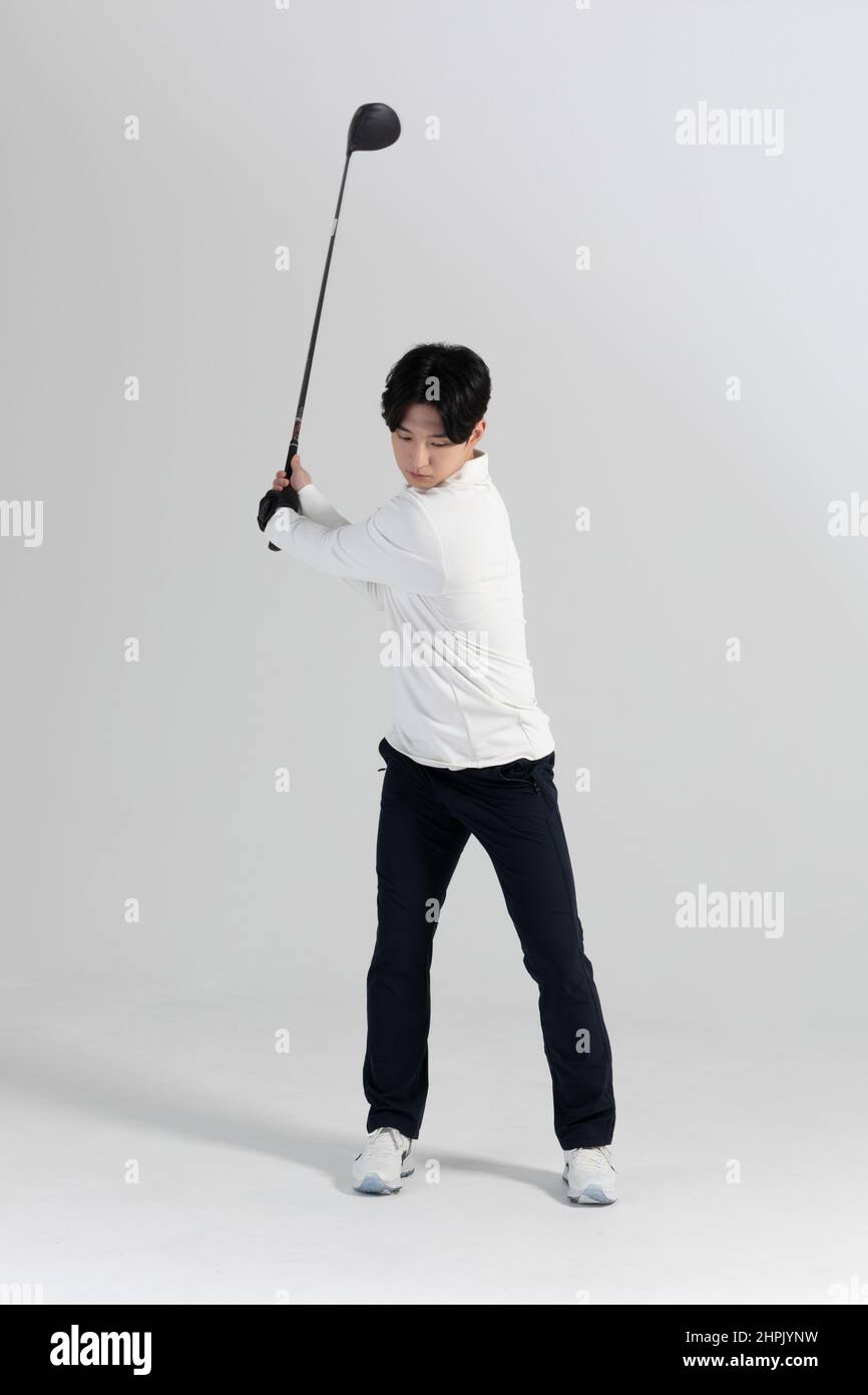 golf sports player, asian korean man with golf club in studio Stock ...
