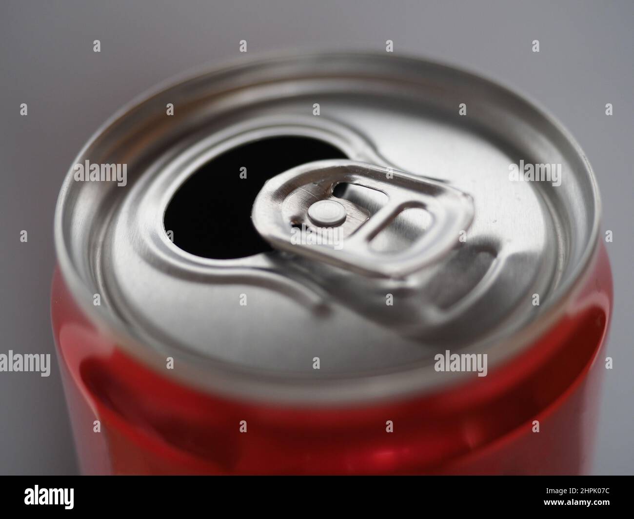 red tin can for soft drinks and soda Stock Photo - Alamy