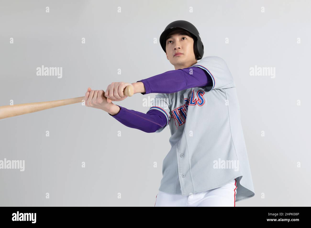 baseball sports player, asian korean man with bat Stock Photo - Alamy