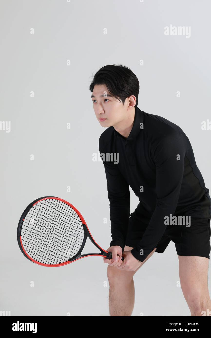 tennis sports player, asian korean man with racket, studio Stock Photo ...
