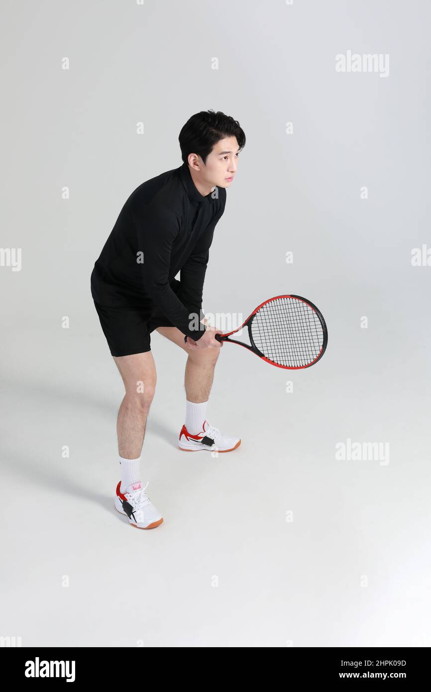 tennis sports player, asian korean man with racket, studio Stock Photo ...