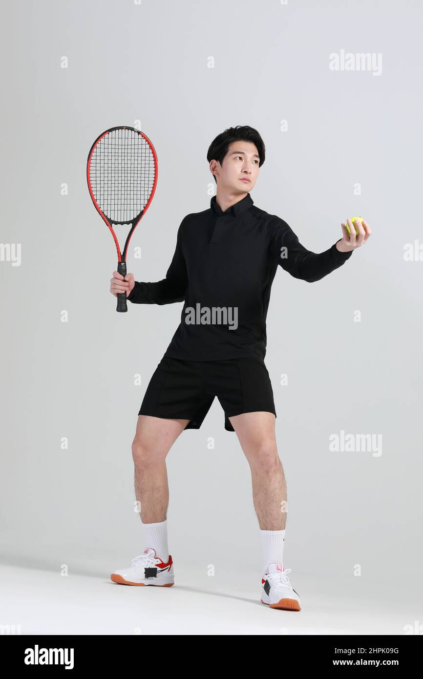 tennis sports player, asian korean man with racket, studio Stock Photo ...