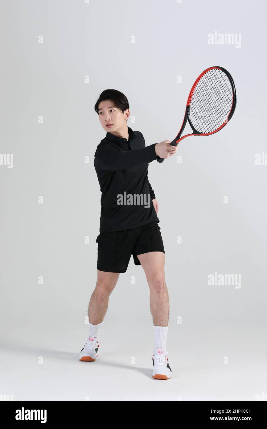 tennis sports player, asian korean man with racket, studio Stock Photo ...