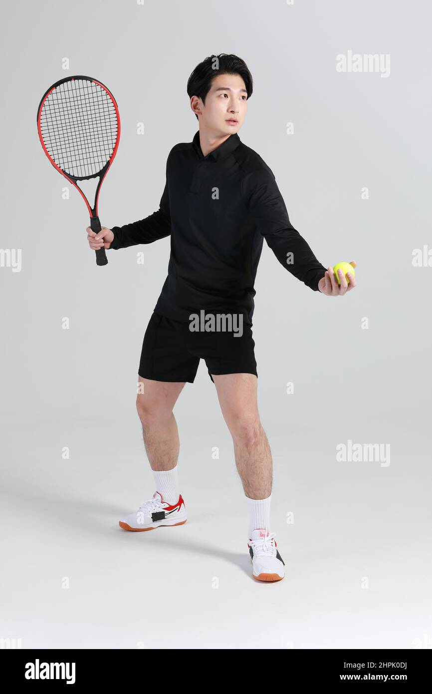 tennis sports player, asian korean man with racket, studio Stock Photo ...