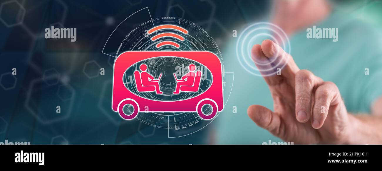 Man touching a self-driving car concept on a touch screen with his ...