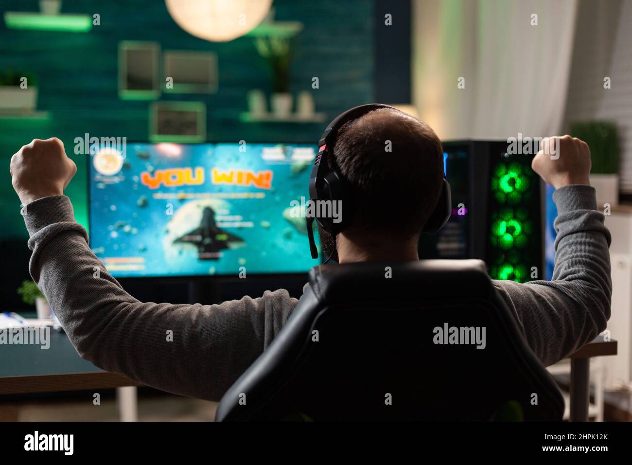 Professional gamer celebrating after hi-res stock photography and ...