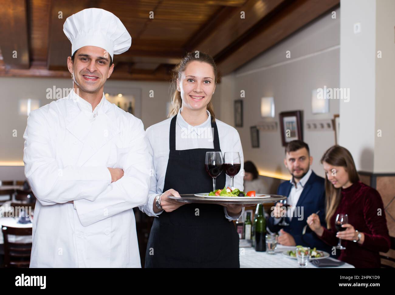 Portrait of chef and waitress Stock Photo - Alamy