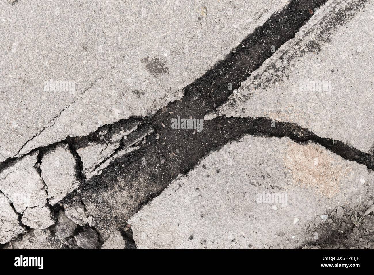 Large crack stratification separation of asphalt road broken damaged ...