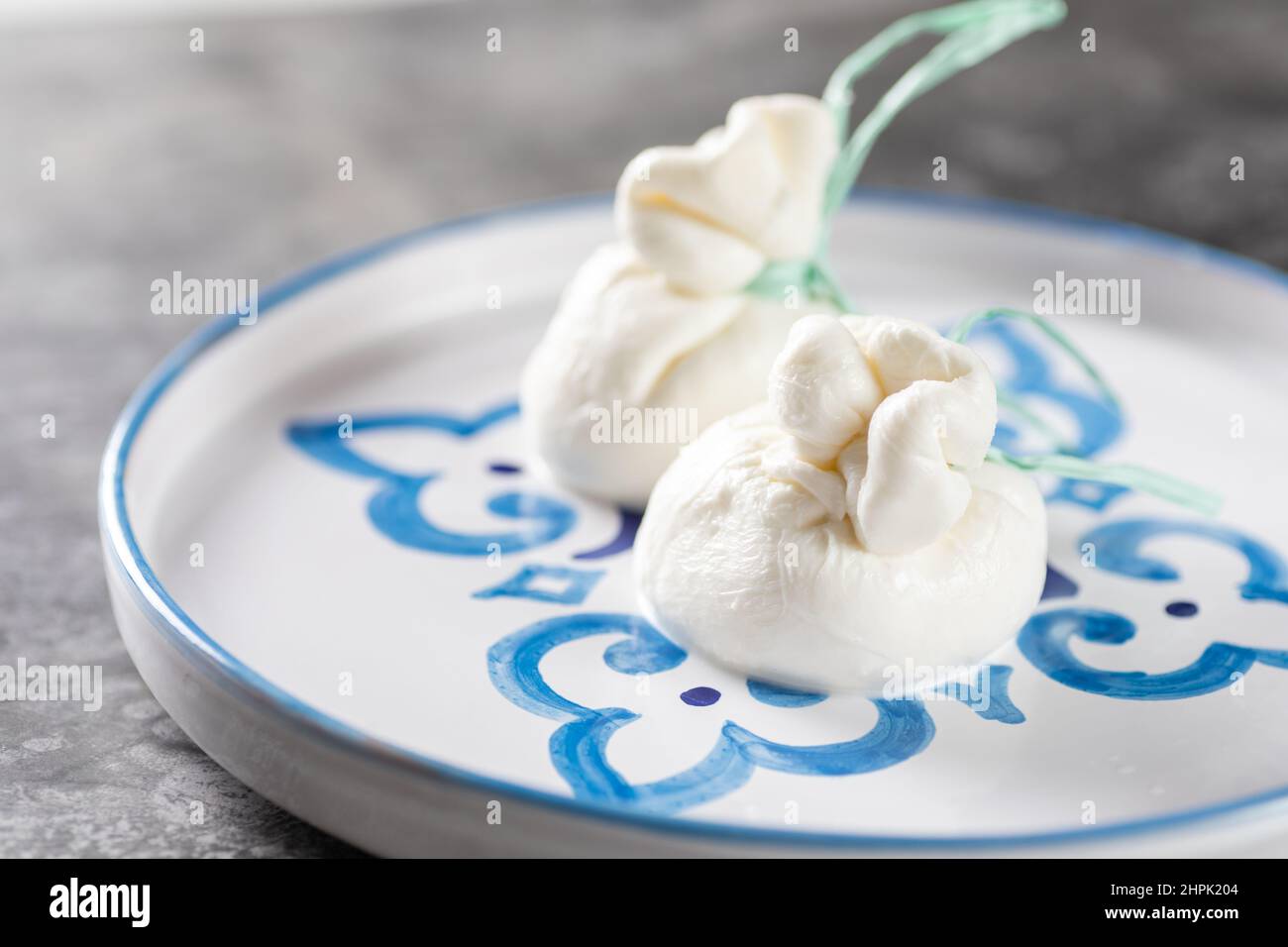 Italian burrata cheese made from mozzarella with cream inside from ...