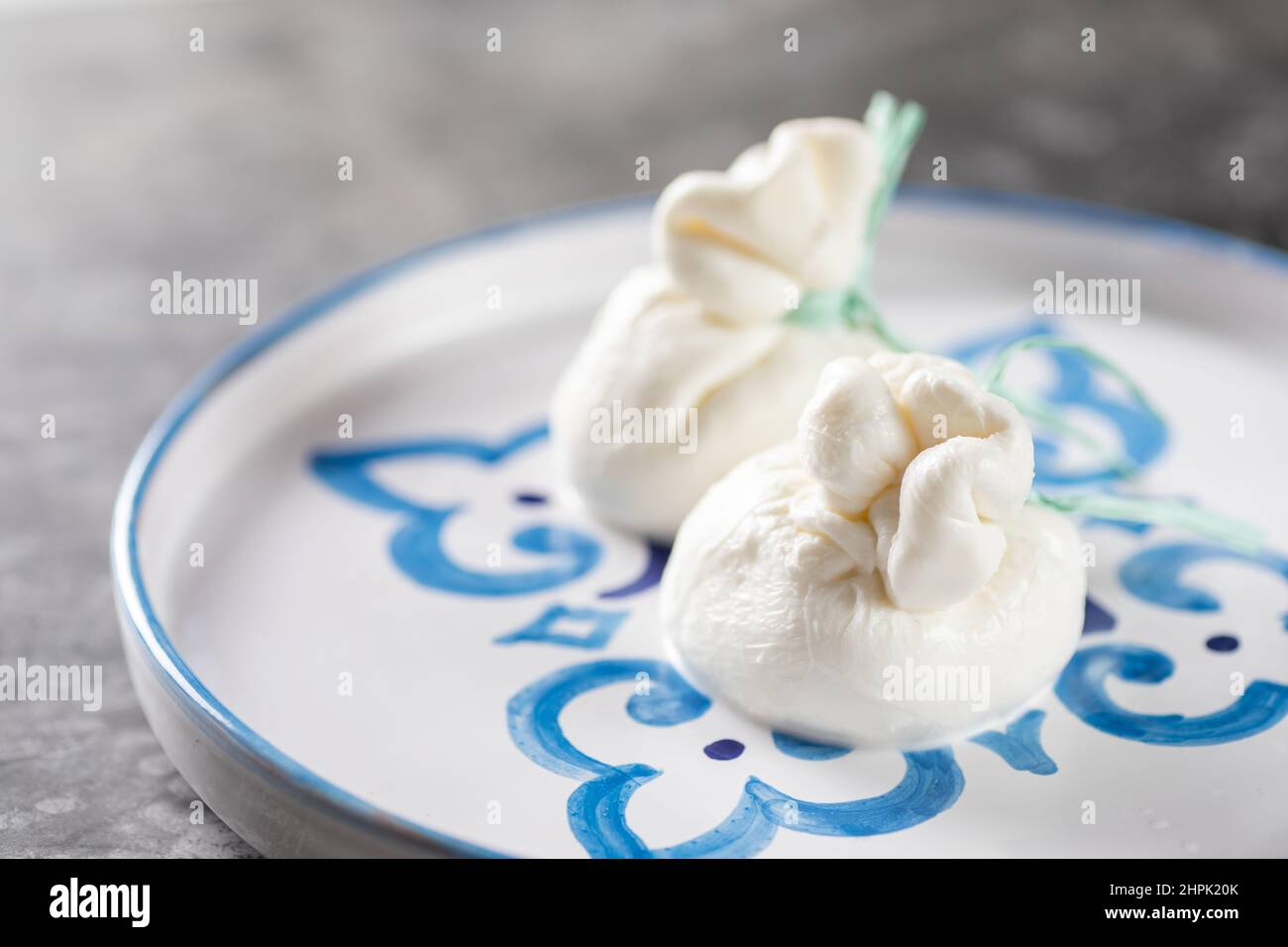 Italian burrata cheese made from mozzarella with cream inside from ...