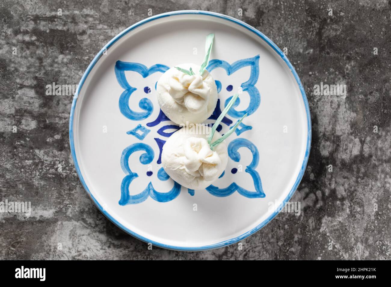 Italian burrata cheese made from mozzarella with cream inside from ...