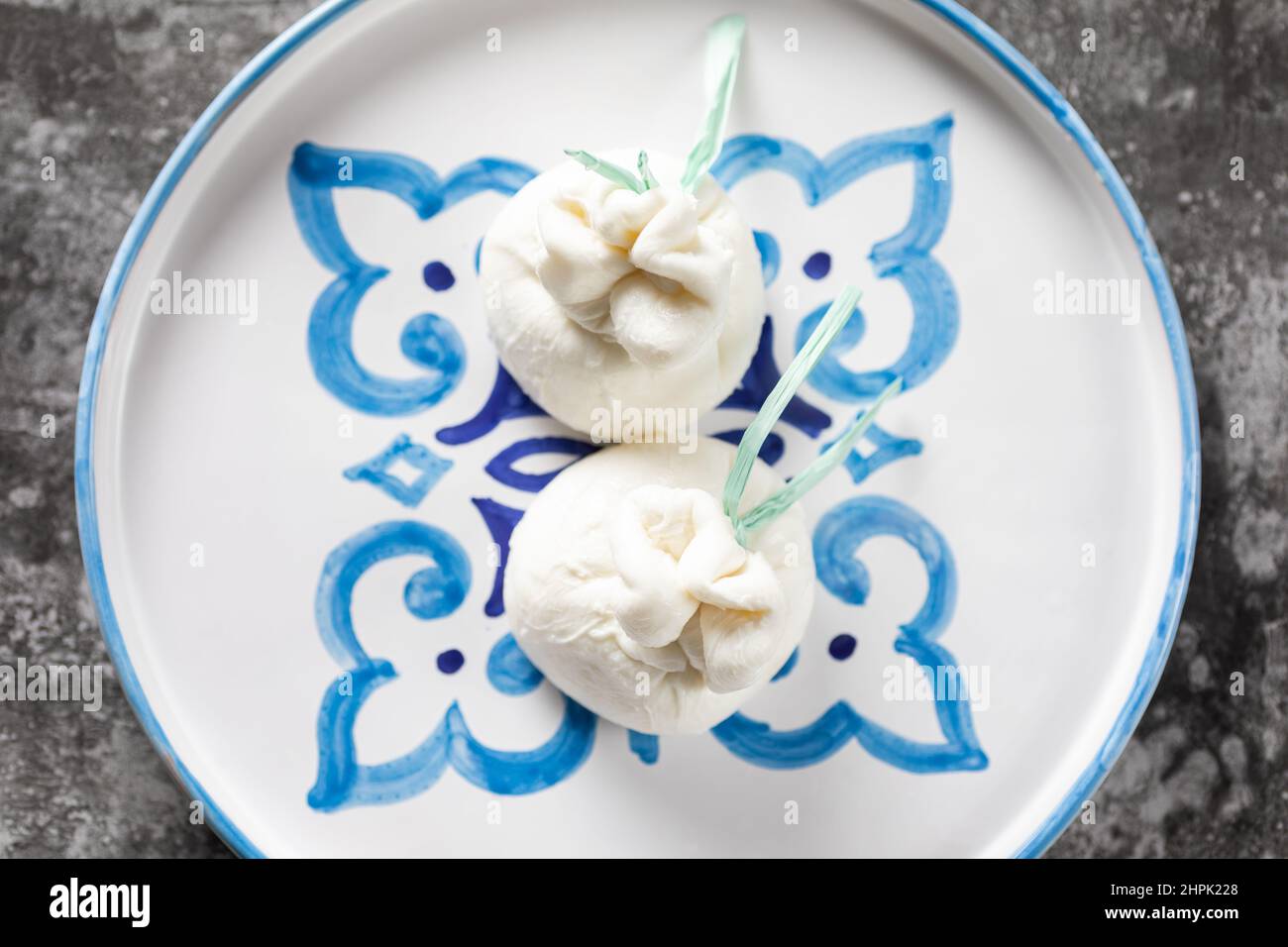 Italian burrata cheese made from mozzarella with cream inside from ...