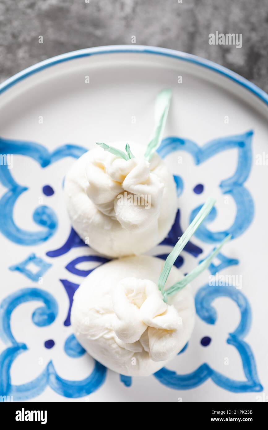 Italian burrata cheese made from mozzarella with cream inside from ...