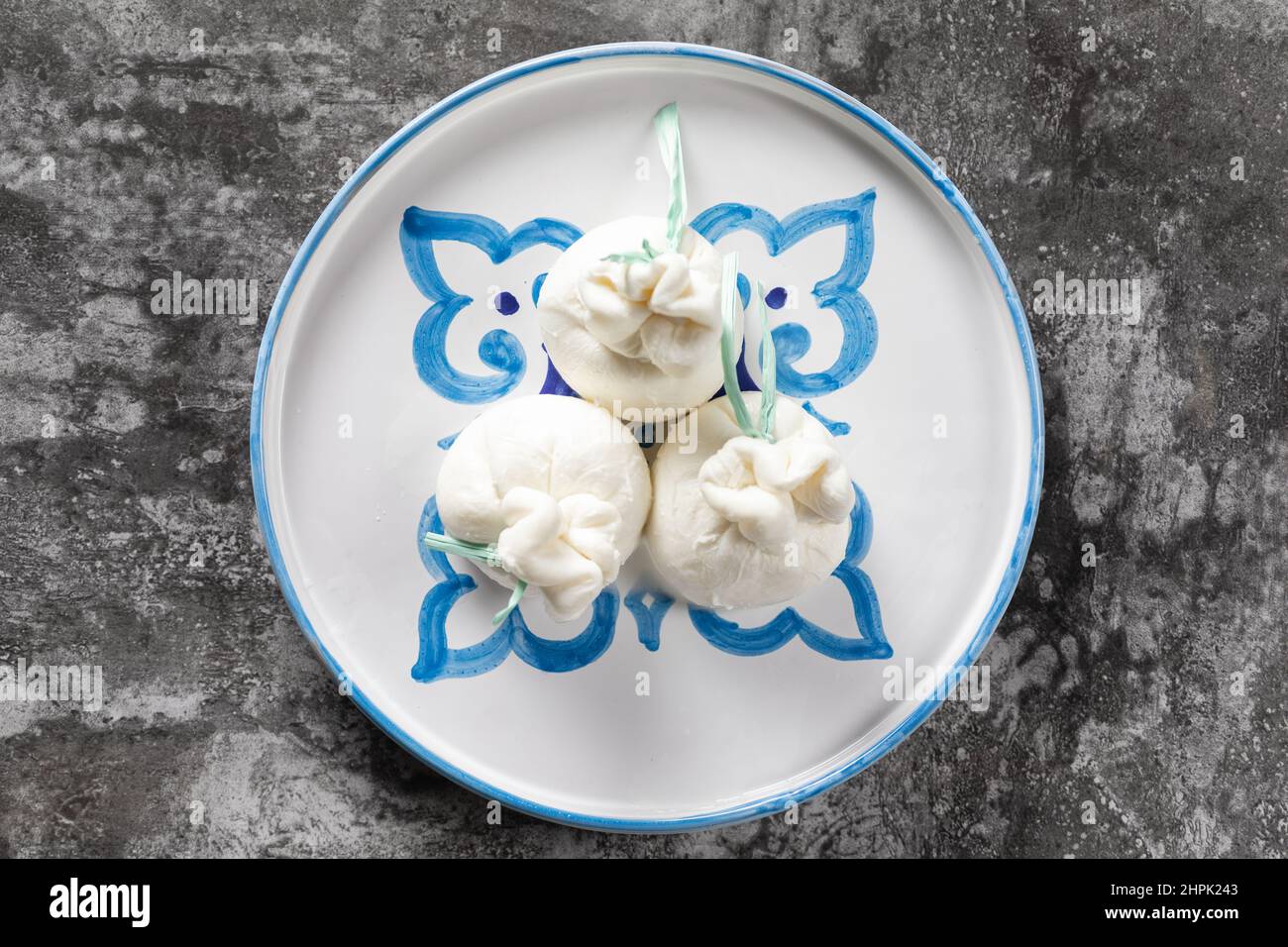 Italian burrata cheese made from mozzarella with cream inside from ...
