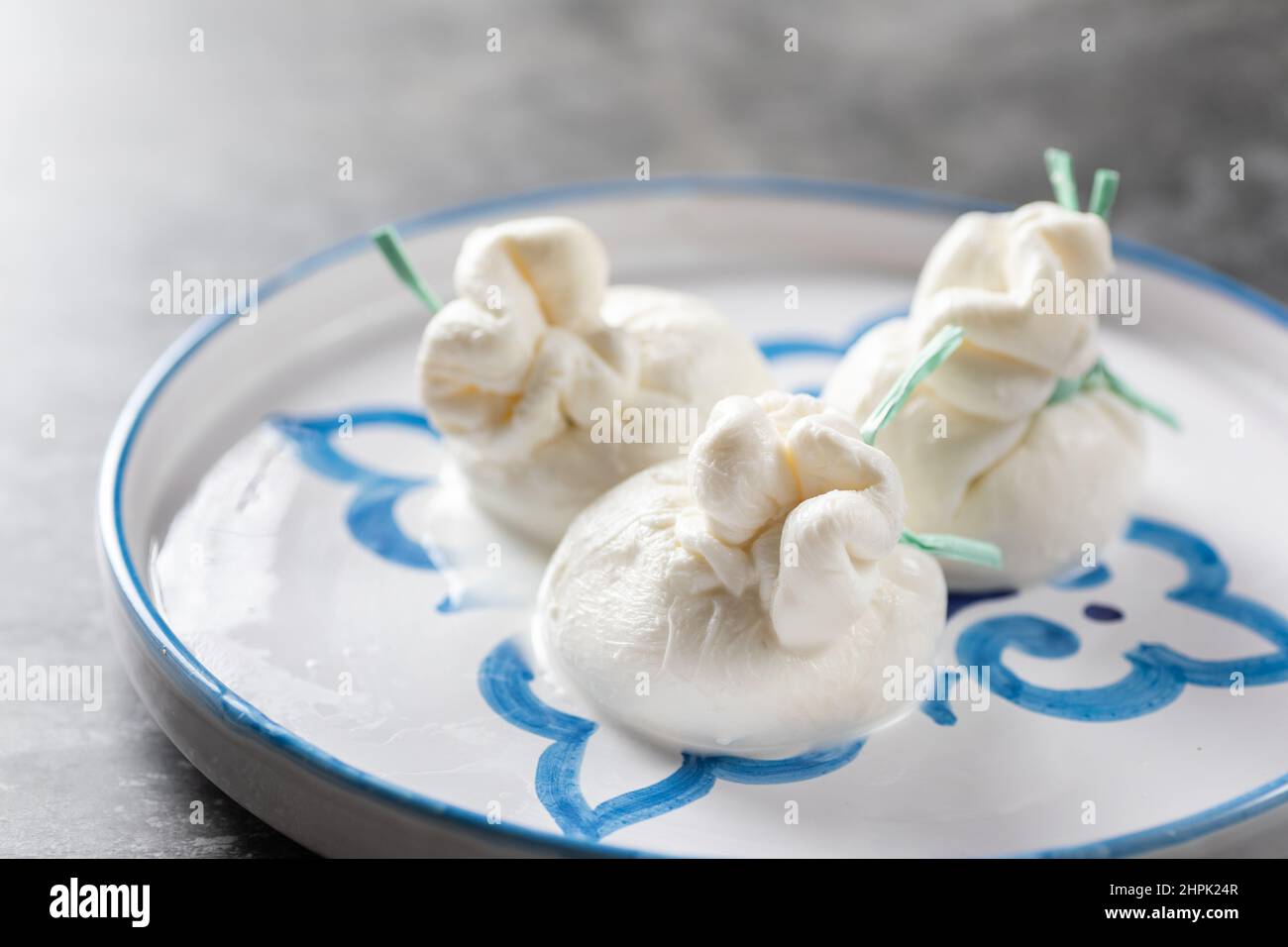 Italian burrata cheese made from mozzarella with cream inside from ...