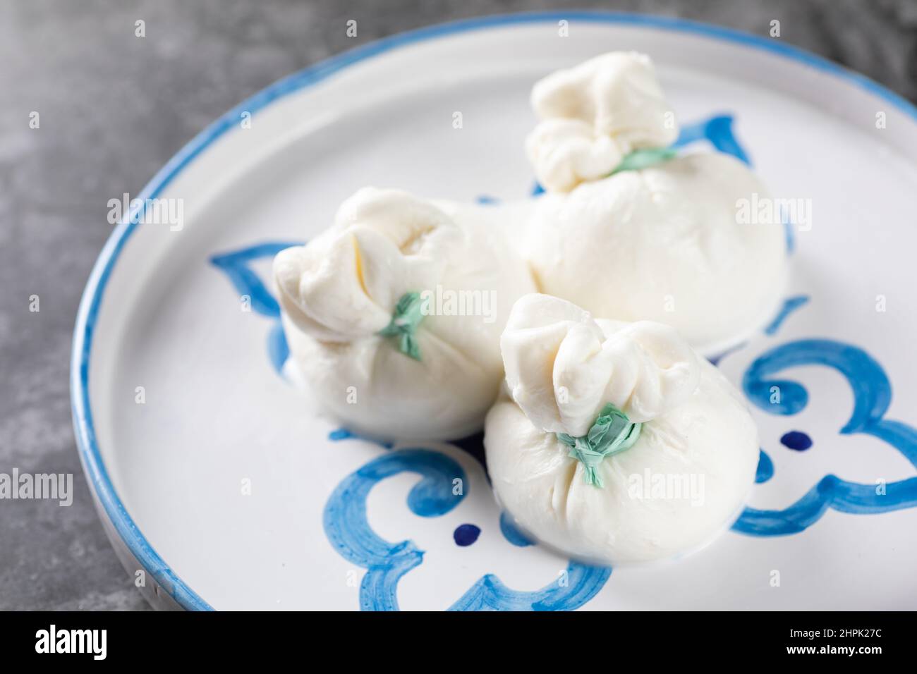 Italian burrata cheese made from mozzarella with cream inside from ...