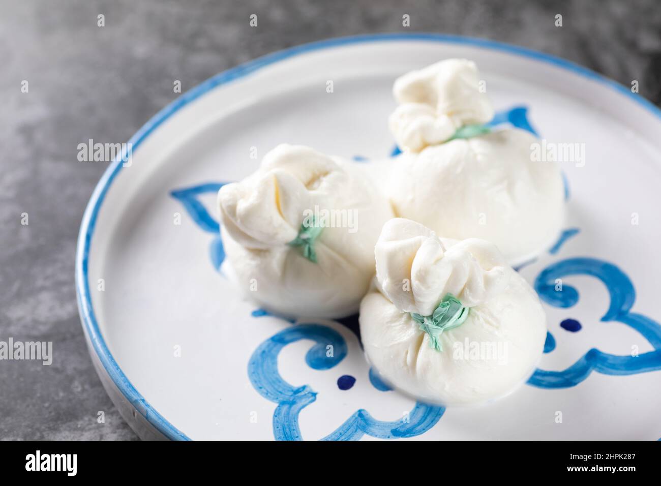 Italian burrata cheese made from mozzarella with cream inside from ...