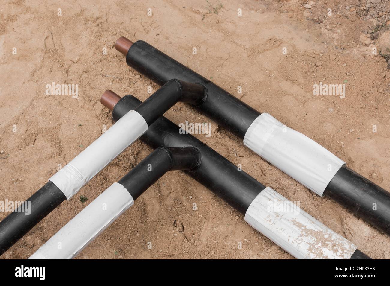 Repair of the water line of the heating main pipe in the ground trench ...