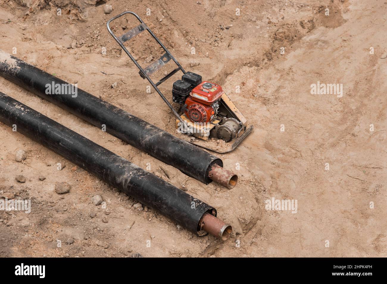 Repair of the water line of the heating main pipe in the ground ...