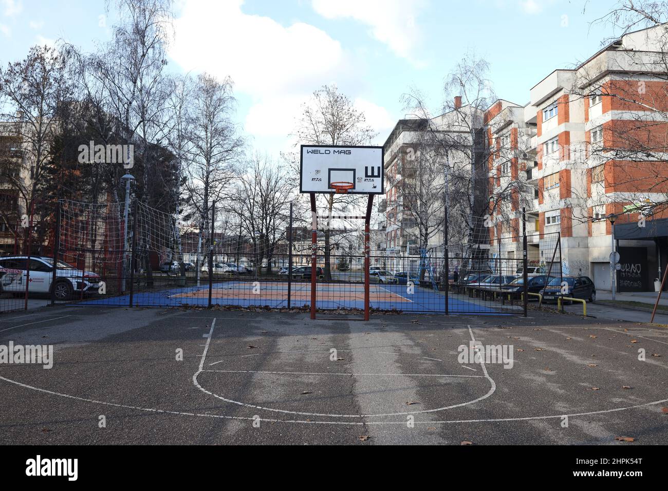 Basketball playground surrounded by residential building Stock Photo ...