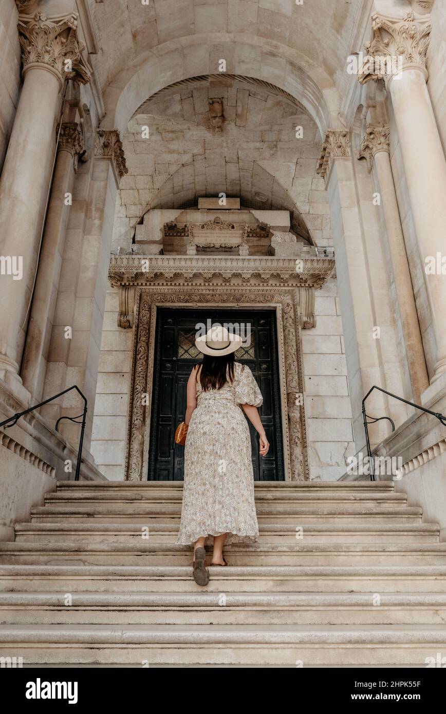 Female walking on stone stairs of St. Domnius cathedral in Split ...