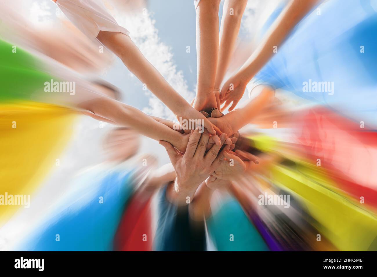 Kids hands stacked sports hi-res stock photography and images - Alamy