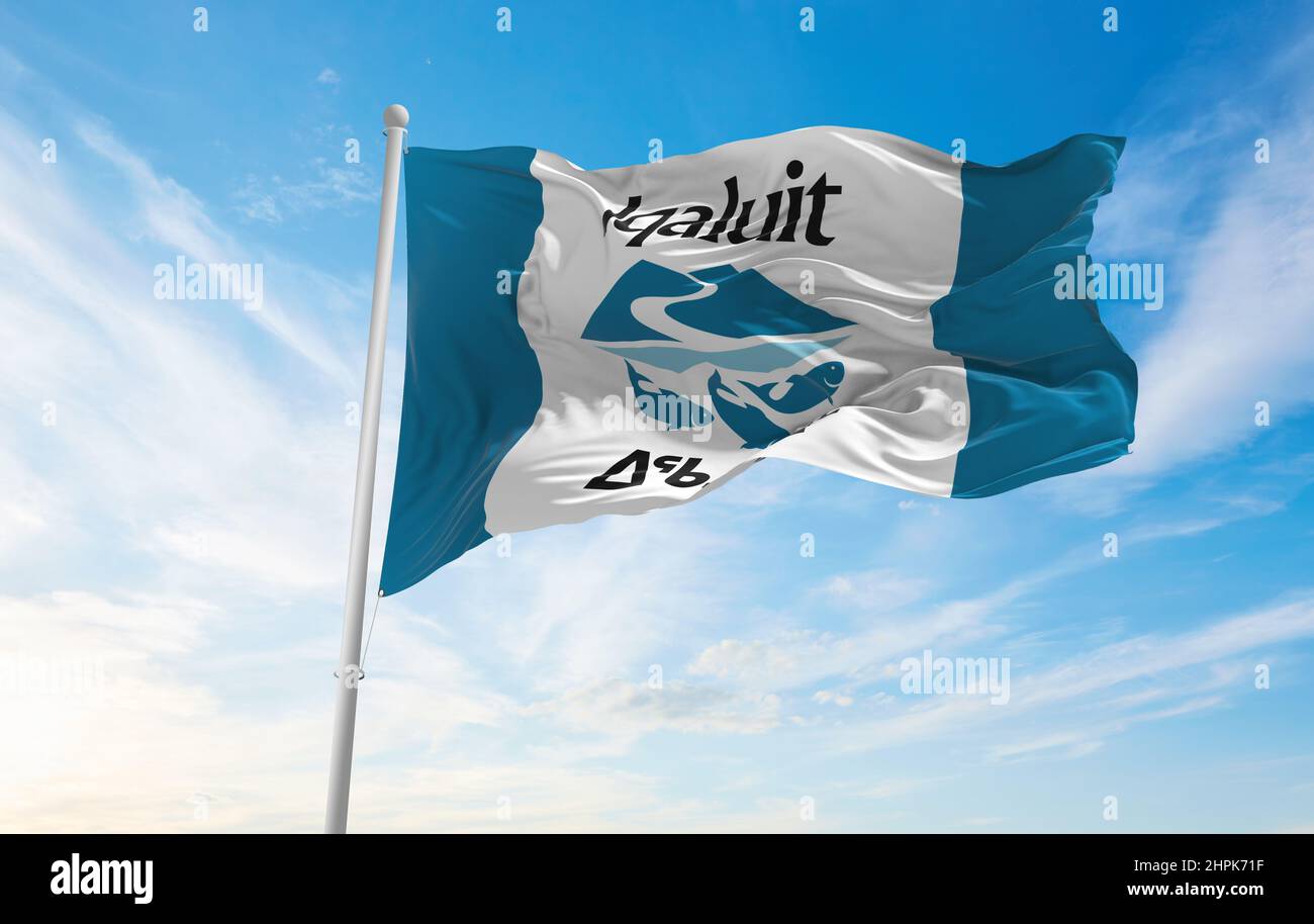 flag of Iqaluit, Nunavut , Canada at cloudy sky background on sunset ...